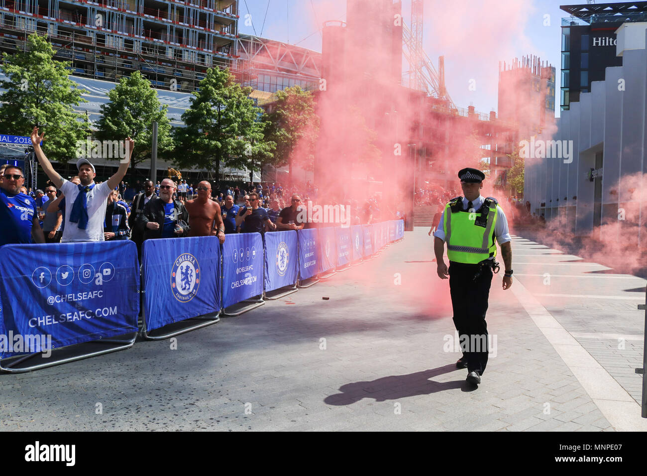 Wembley Middlesex, UK. 19th May 2018. Red smoke flares are thrown in ...