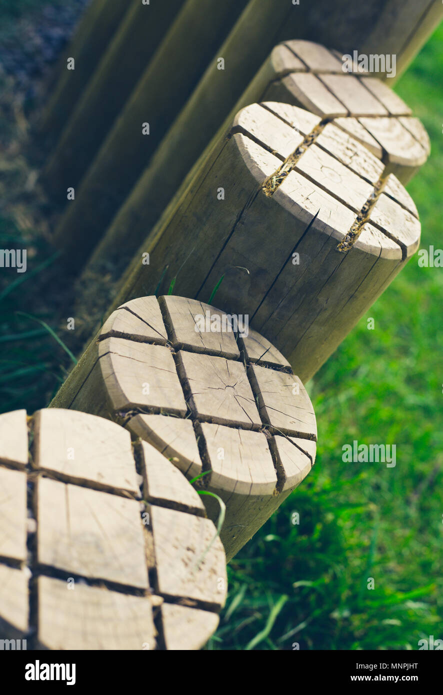 closeup photo of little wooden posts at a kids' playground Stock Photo ...