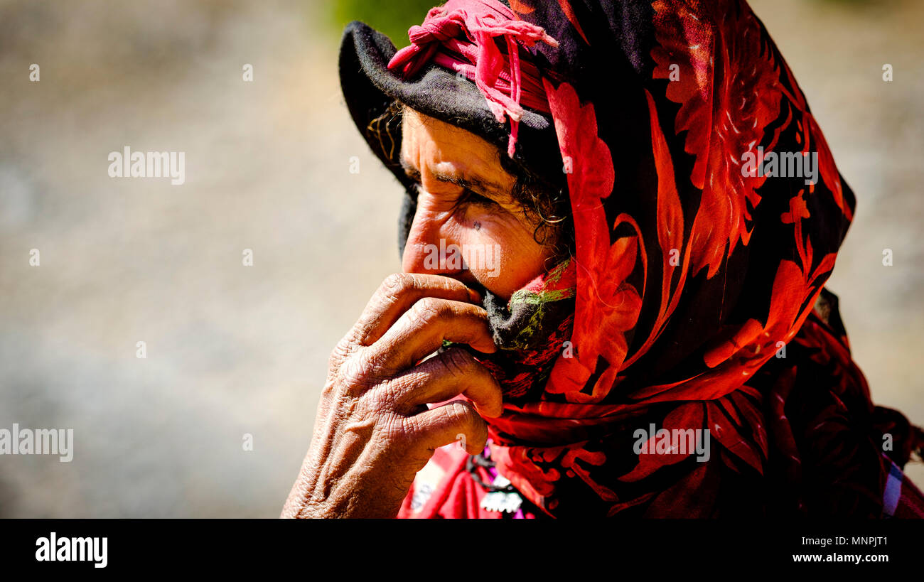Portrait of a nomadic woman in the Dades Valley in southern Morocco ...