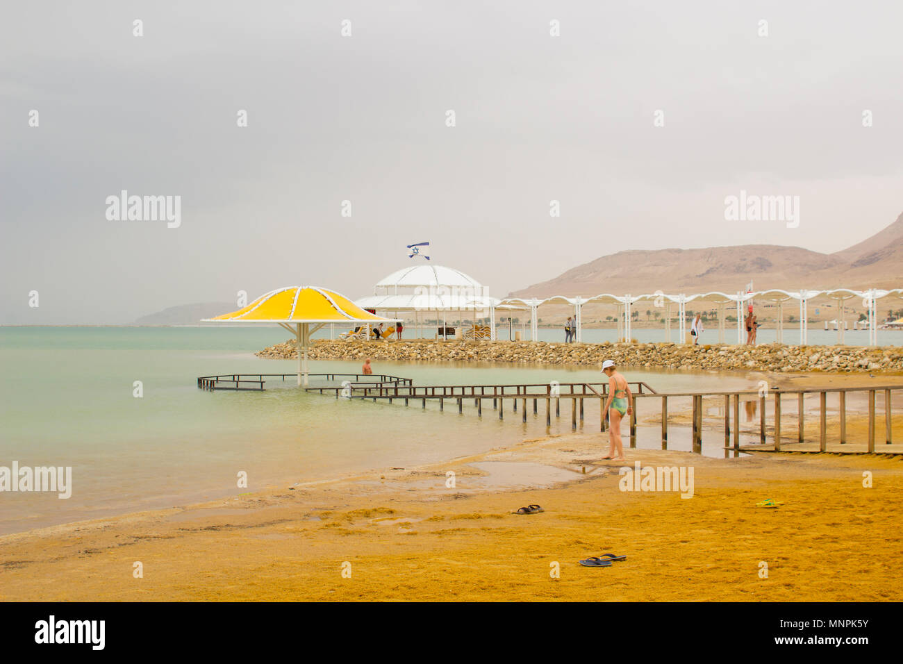 The Ein Bokek beach at the Lot Hotel on the Dead Sea in Judea Israel. Tourists enjoying the ...