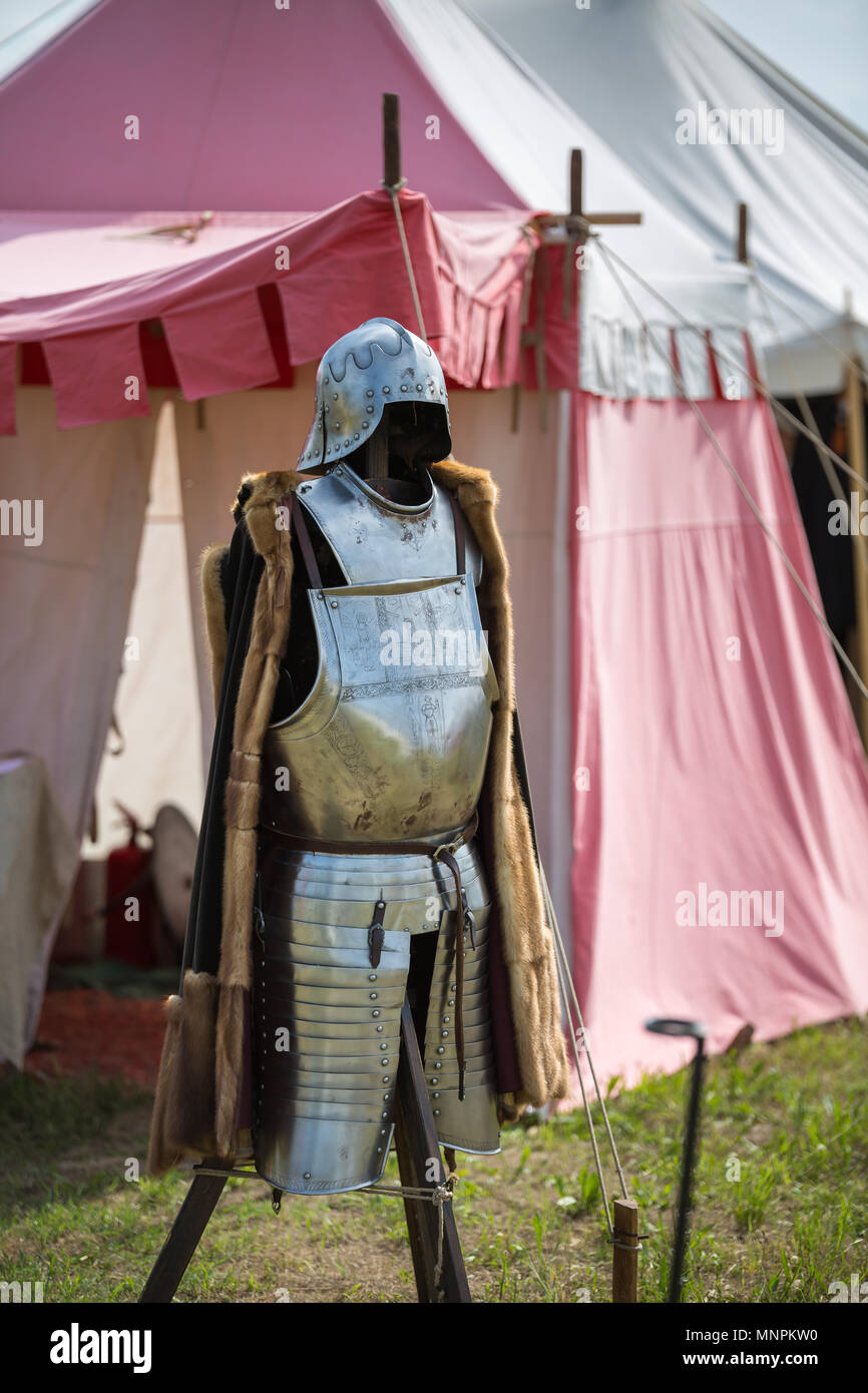 Medieval Metallic Armor and Ancient Tent in background Stock Photo - Alamy