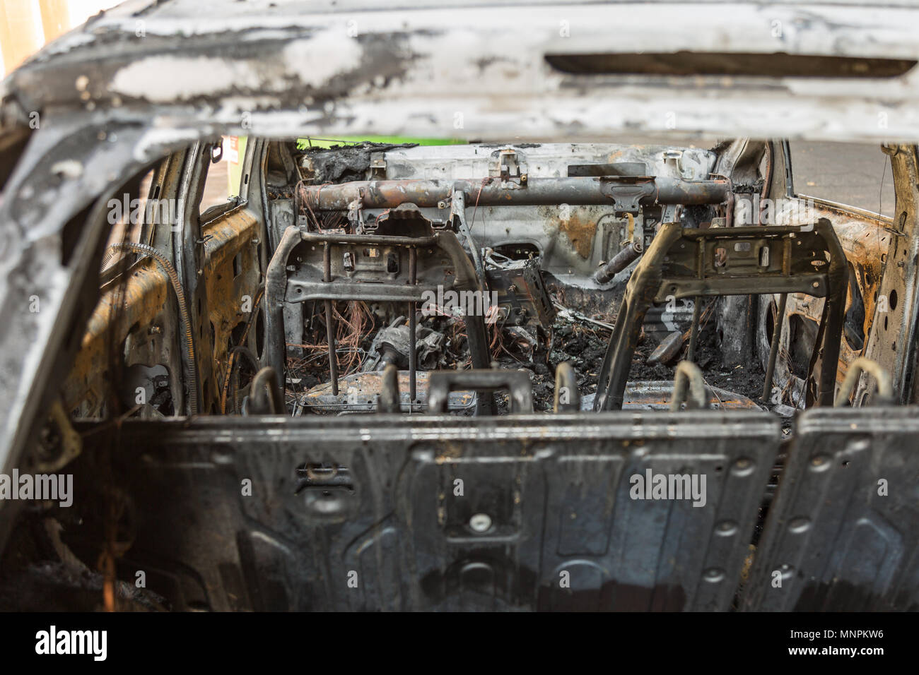 Close-up of Burned Out Car on the Street Stock Photo - Alamy