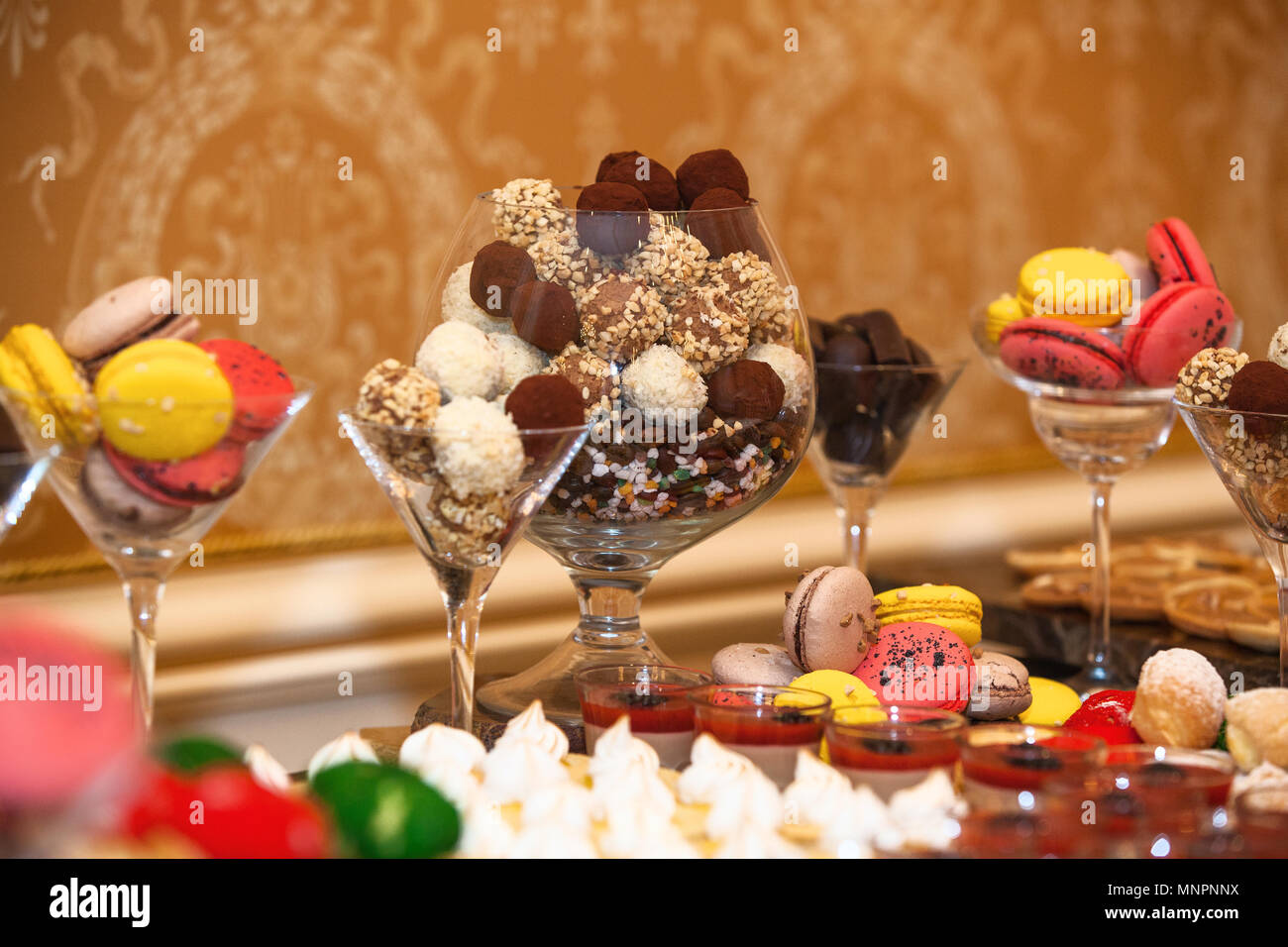 Different kinds of sweets and candies at the buffet for a party ...