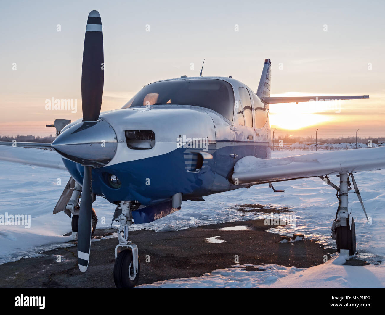 Airplanes parked at a small airport. Light aircraft on a private ...