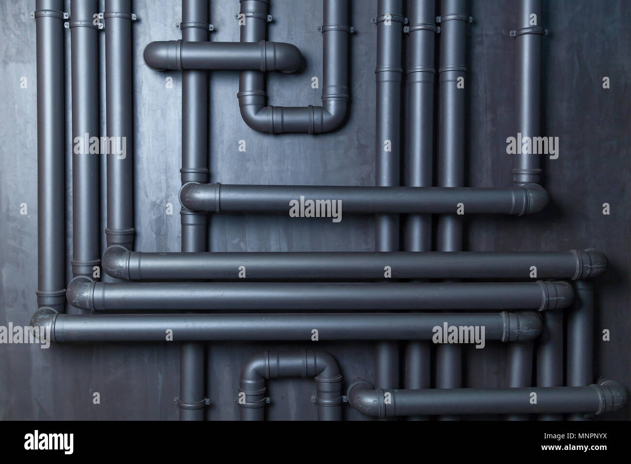 Vintage wall texture background with plastic pipes for design and ...