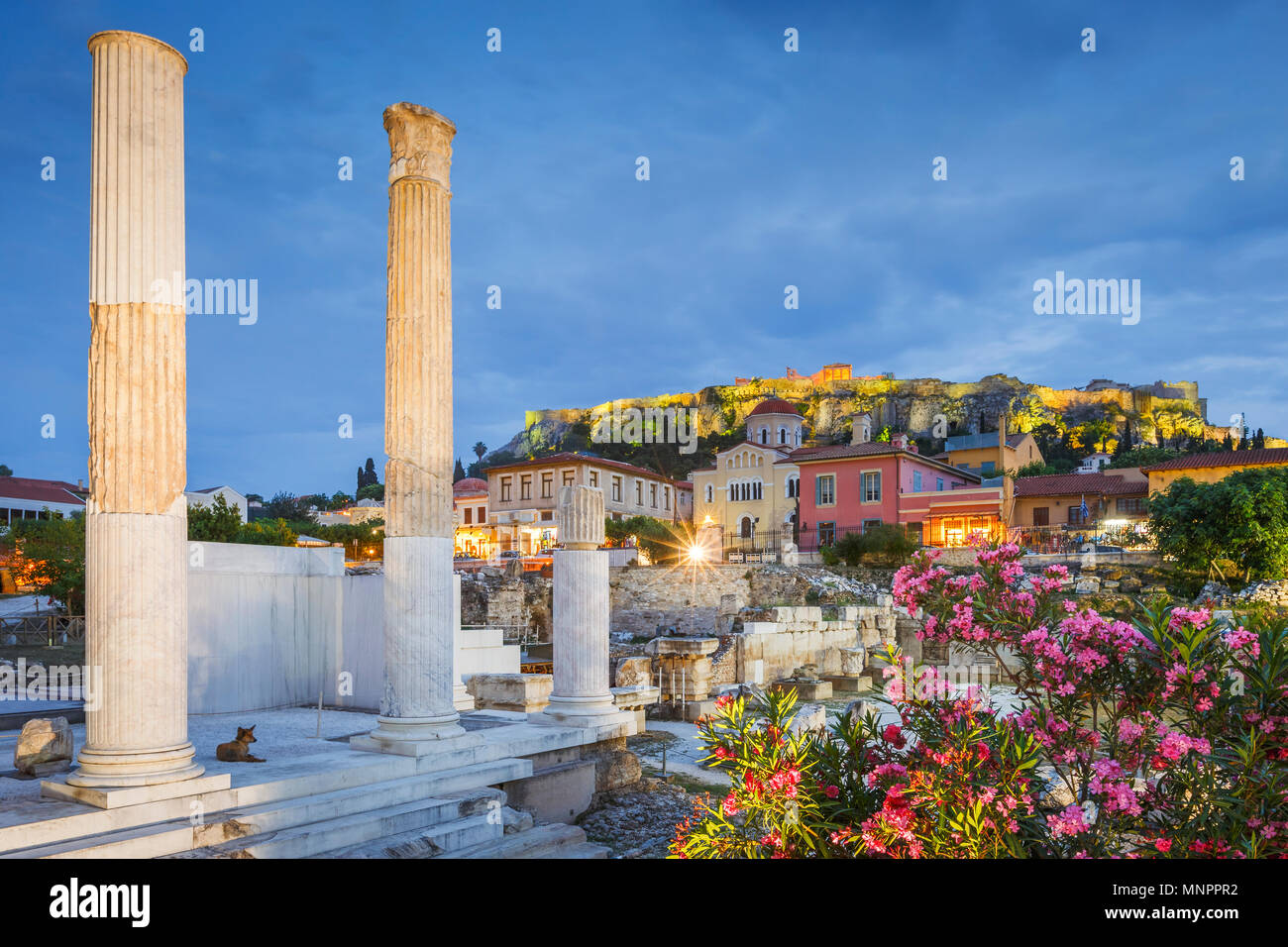 Remains of Hadrian's Library and Acropolis in the old town of Athens ...