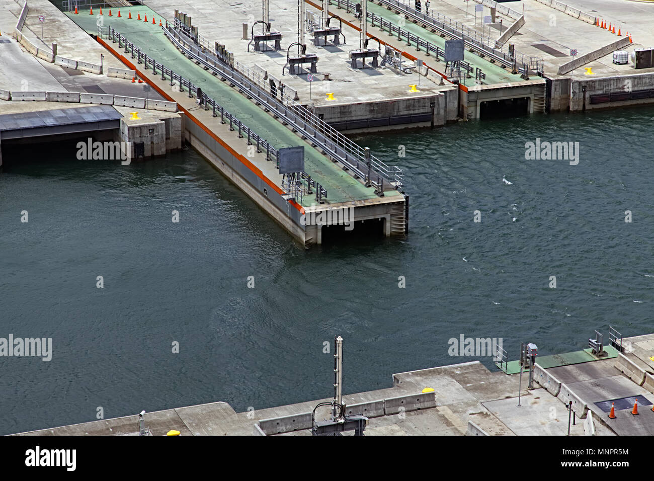 a canal system with locks expanding and contracting Stock Photo - Alamy