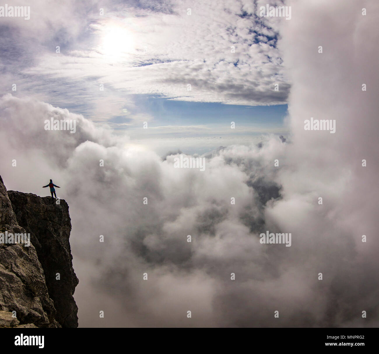 Girl sea cliff climbing hi-res stock photography and images - Alamy