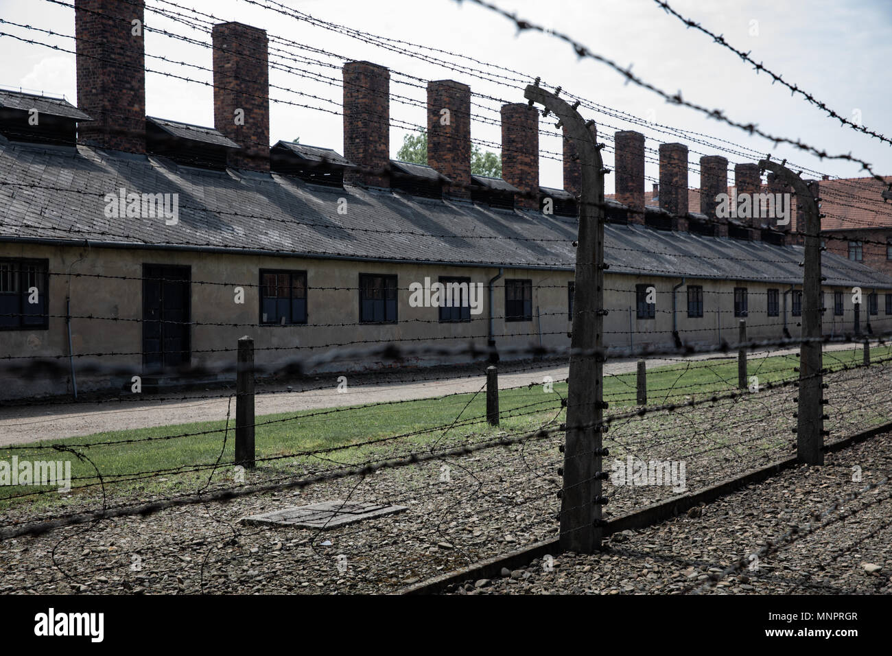 Electric barbed wire fence in Nazi Concentration Camp Auschwitz Stock ...