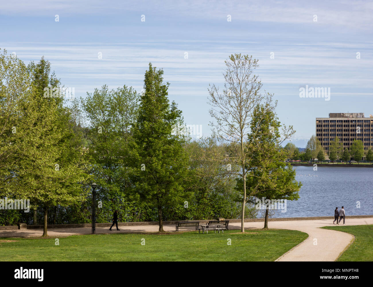 Olympia, Washington / USA - May 5, 2018: People stroll and run through ...
