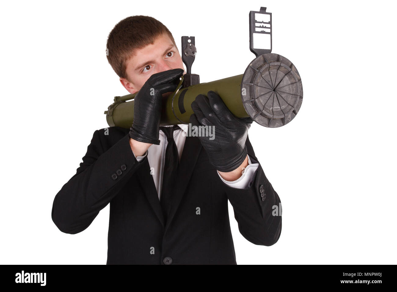 man in black suit and bazooka isolated on white Stock Photo - Alamy