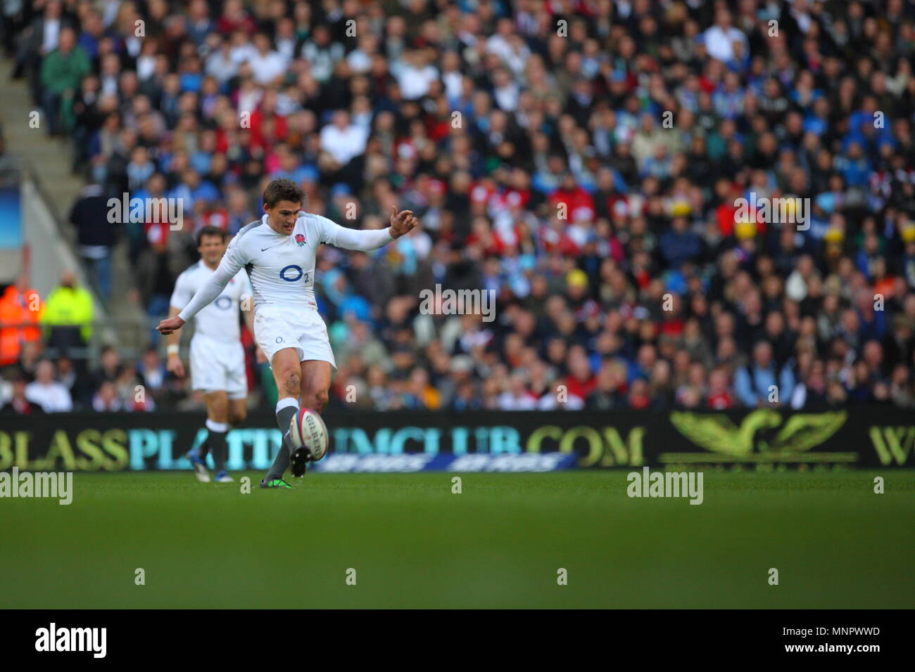 Toby Flood of England drop kicks to restart the match during the ...