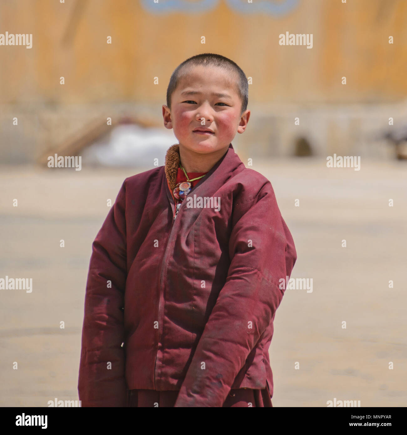 Tibetan kid in Yarchen Gar, Sichuan, China Stock Photo - Alamy