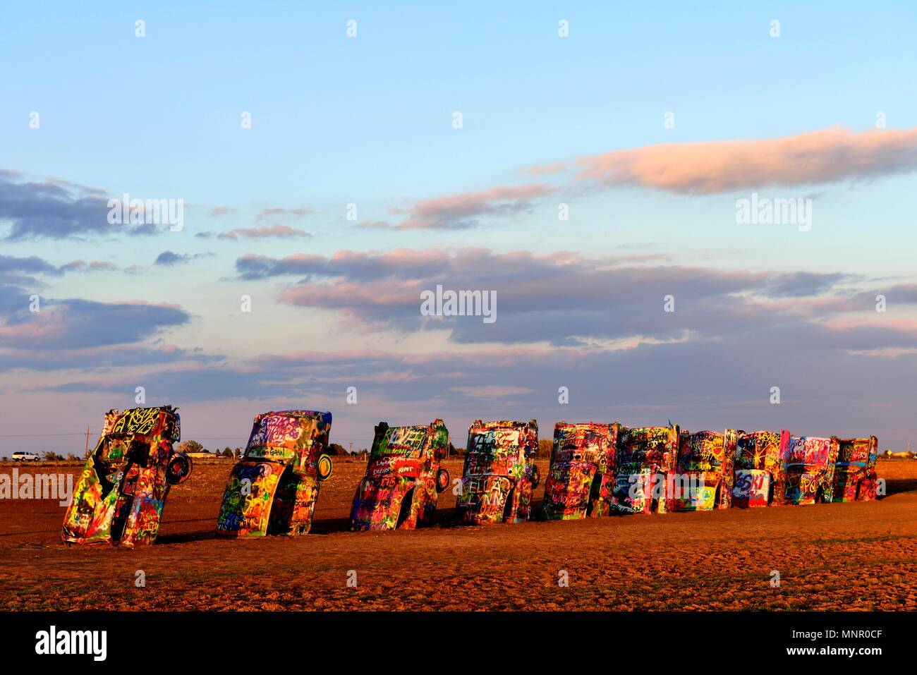 Painted floor-rammed Cadillacs, public art installation Cadillac Ranch ...