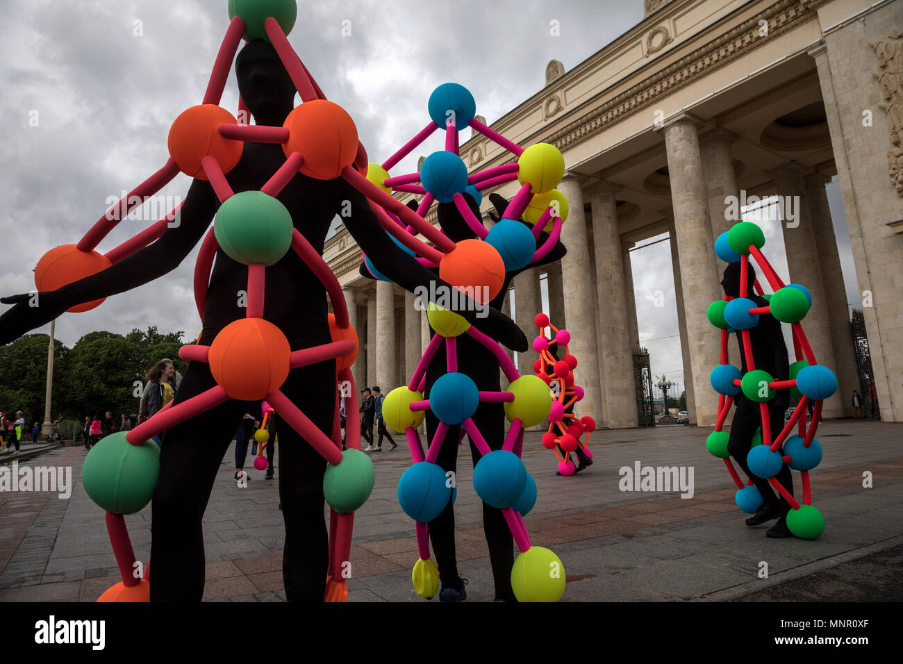 Artists in the costumes of a molecular crystal lattice during the ...