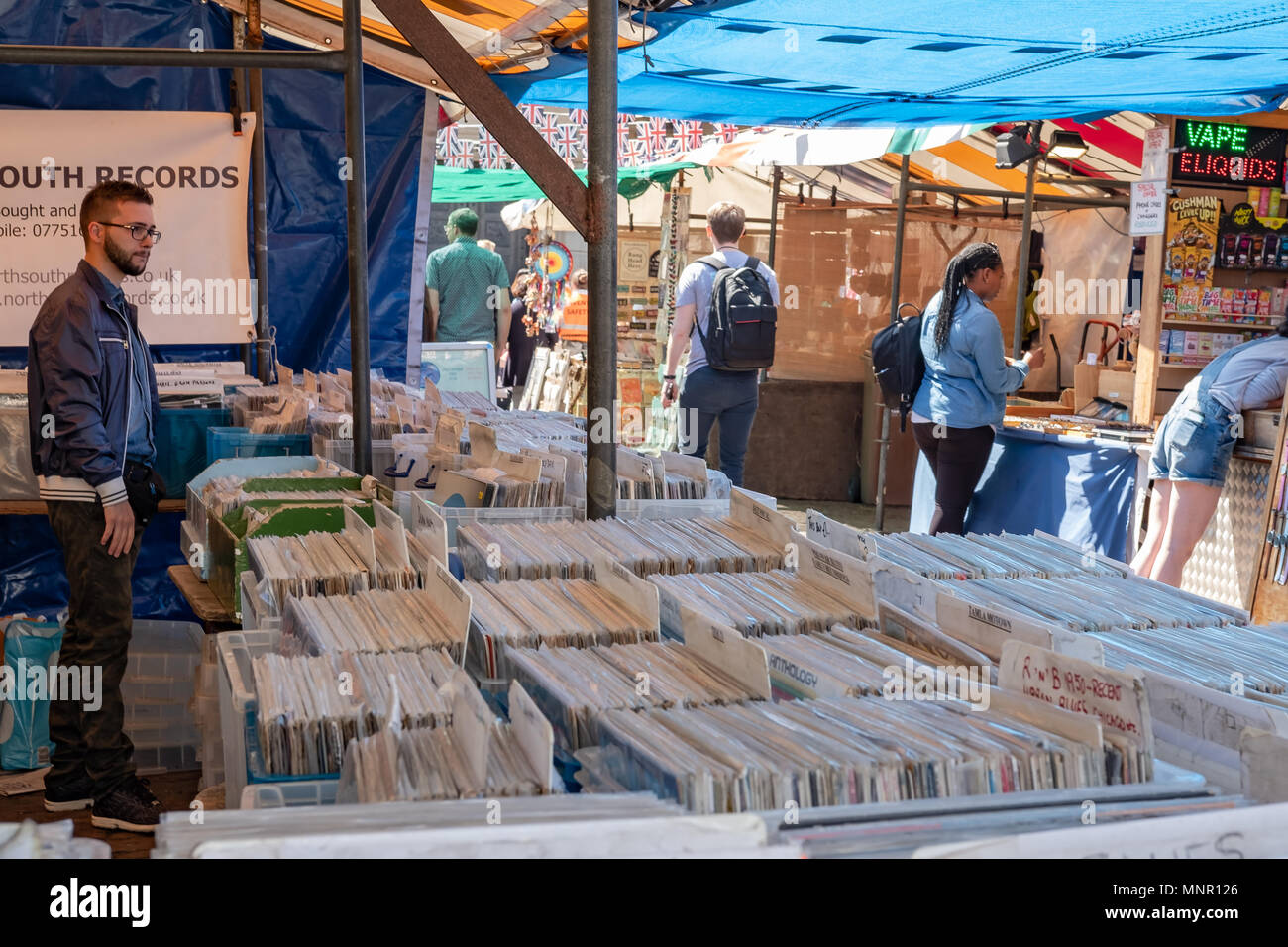 Shallow focus view of nostalgic, vinyl records being sold in an English ...