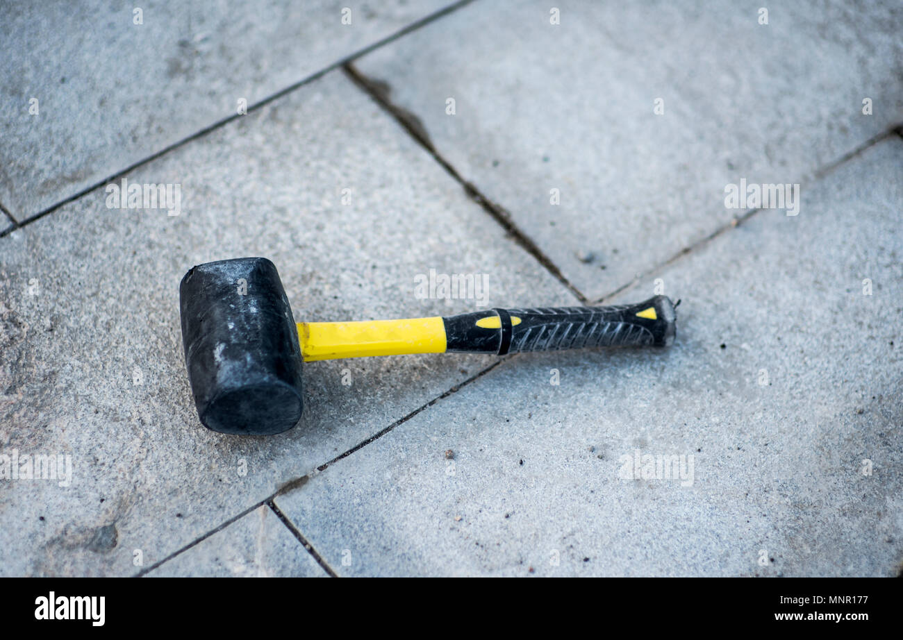 Hammer o granite background. Only for decent Stock Photo - Alamy