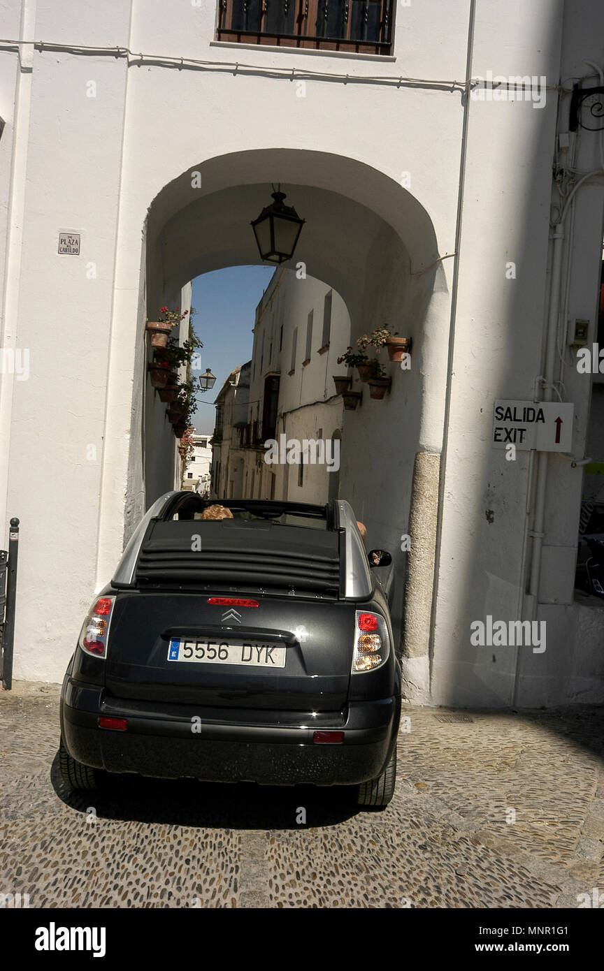 A car approaching a narrow arch in a street, two meters wide.-just ...