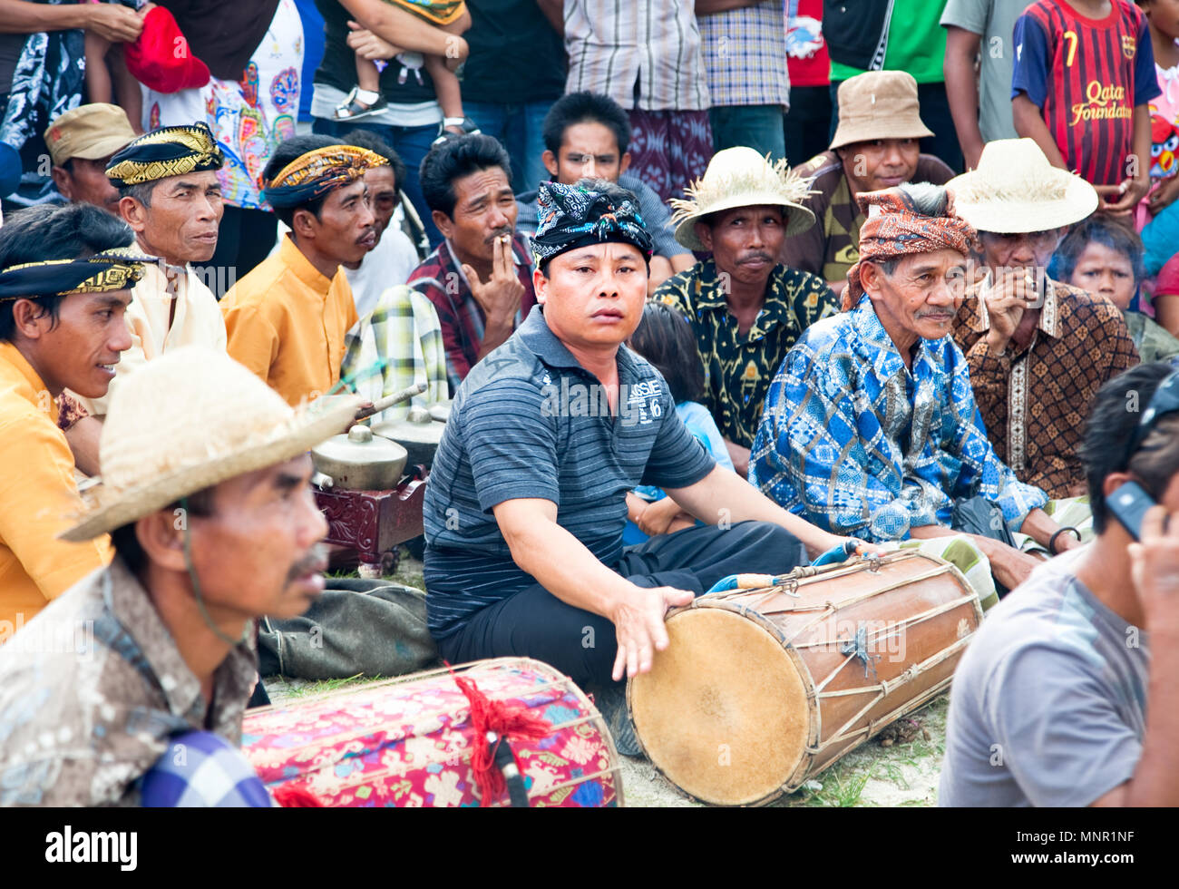 LOMBOK,INDONESIA- FEBRUARY 11: Indonesian man is playing drum on ...