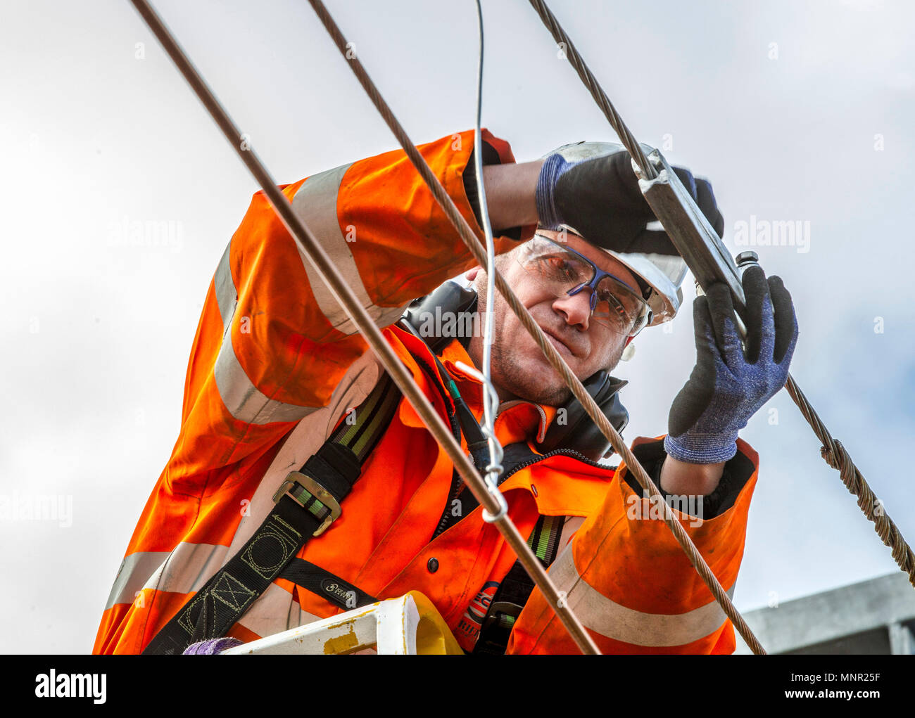 Railway workers working on overhead lines Stock Photo - Alamy