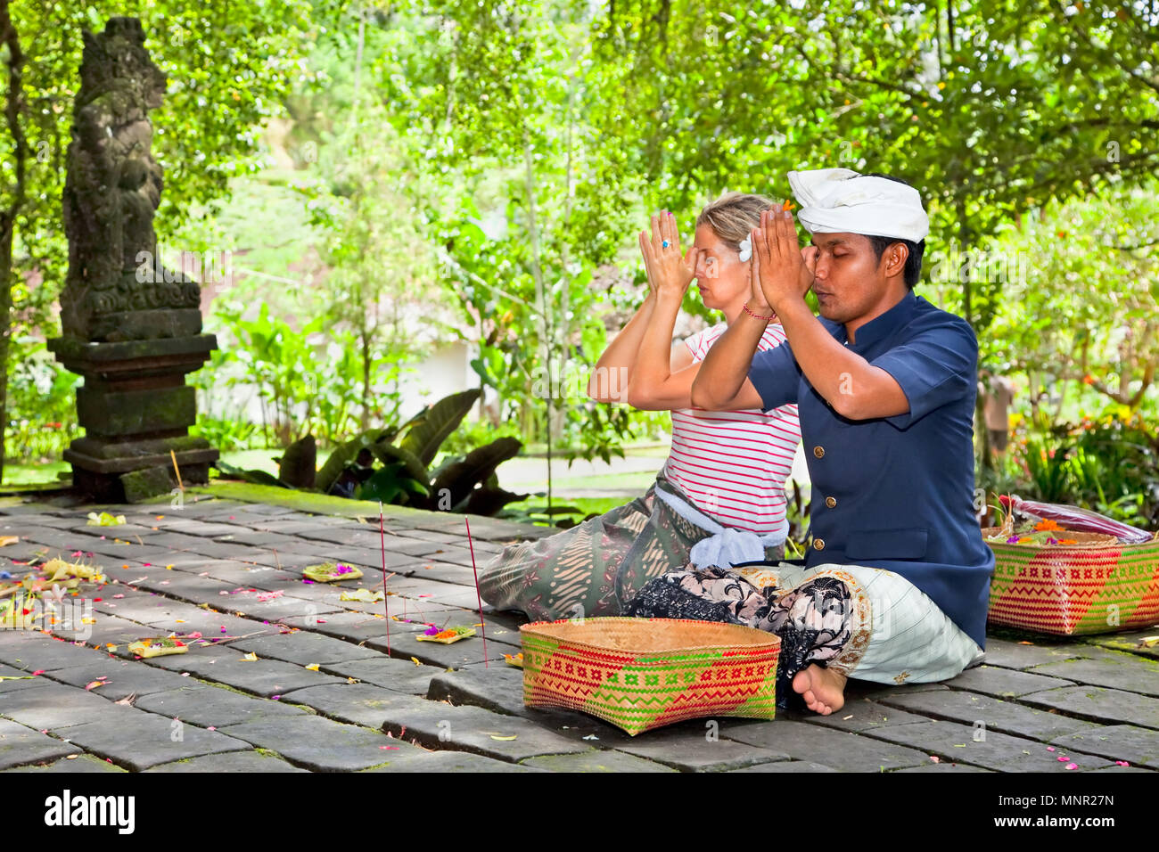 Balinese praying hands hi-res stock photography and images - Alamy