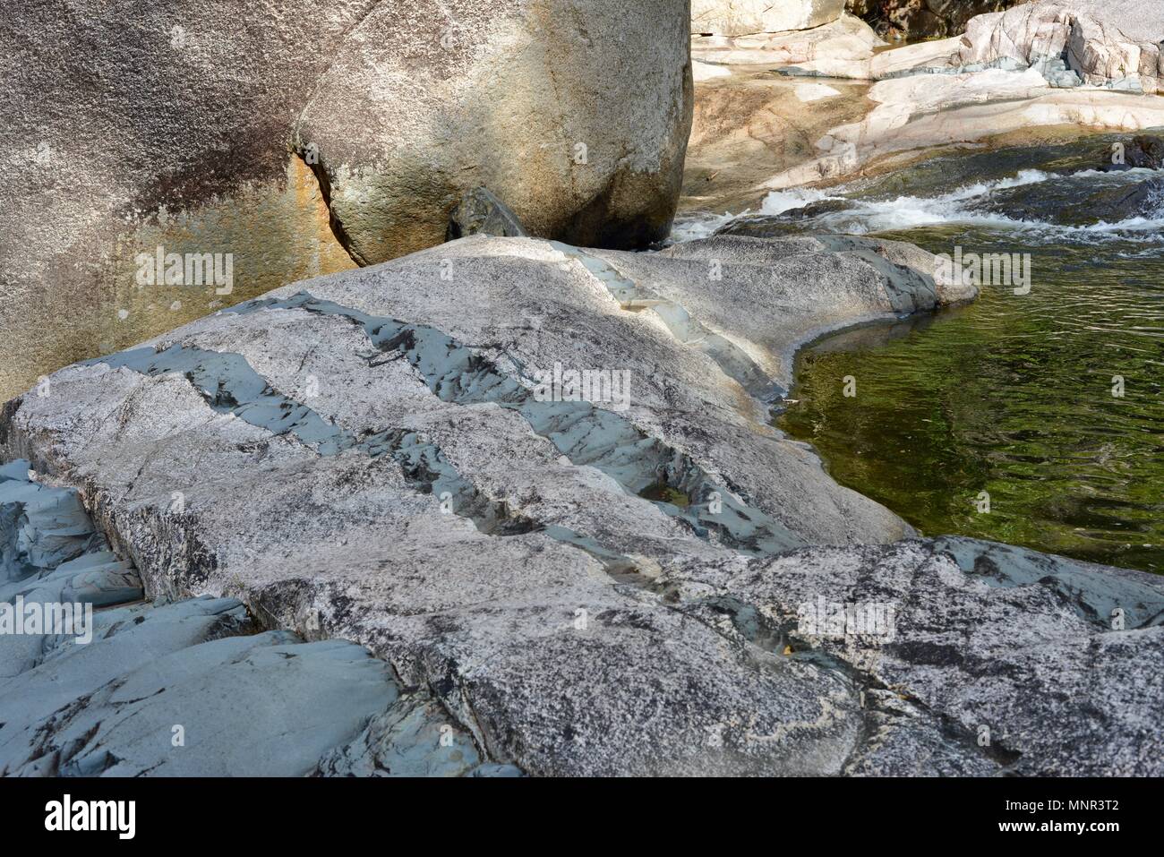 Rock formation displaying granite in layers with grey rock hi-res stock ...