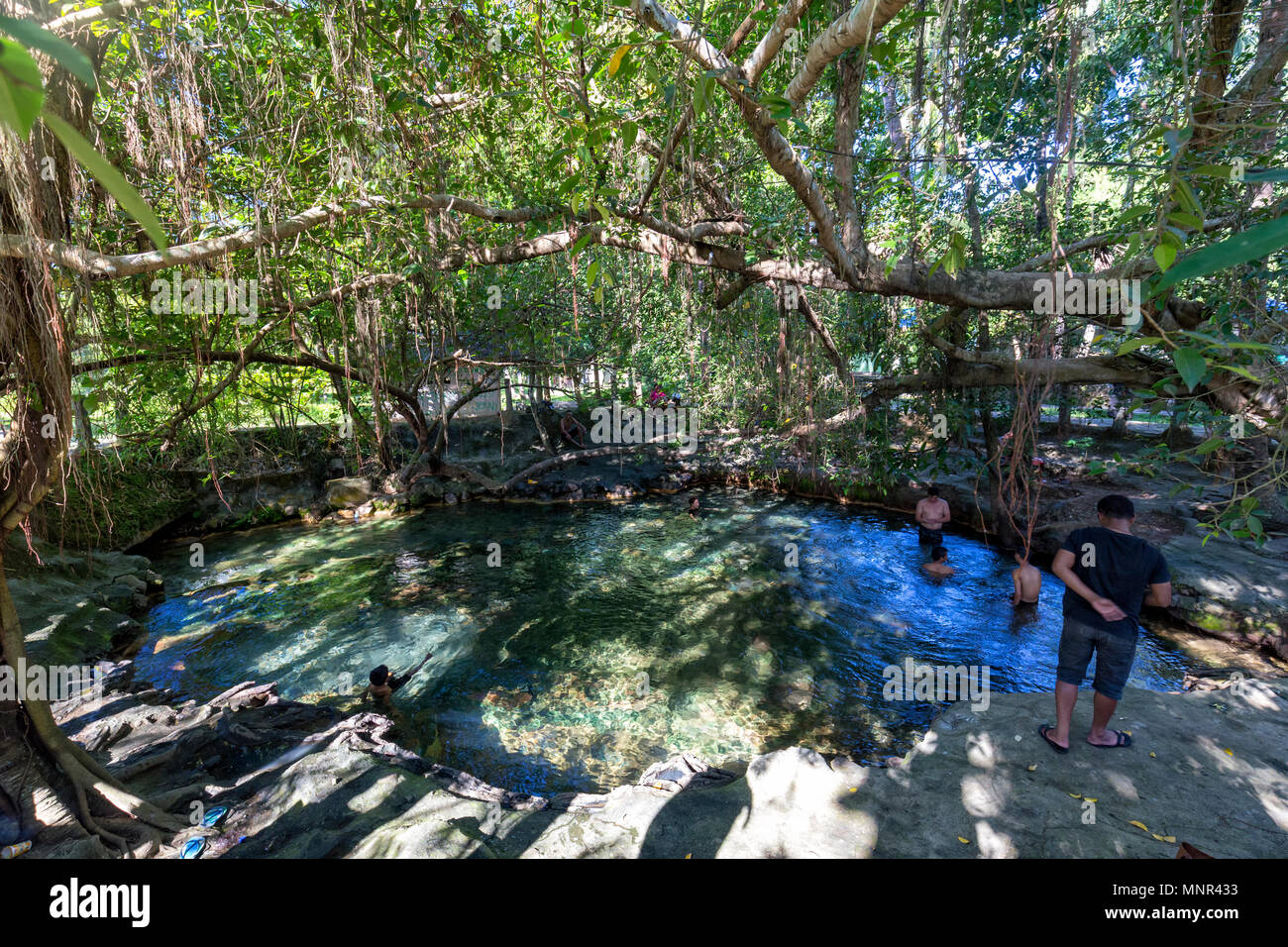 BAJAWA, INDONESIA - MAY 19: Unidentified people relax at a large pool ...