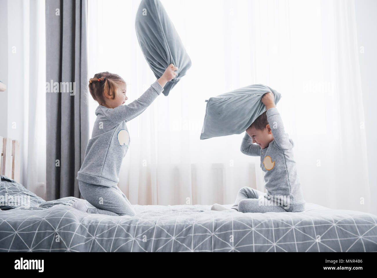 Boy Standing In Bedroom Home Bed High Resolution Stock Photography and ...