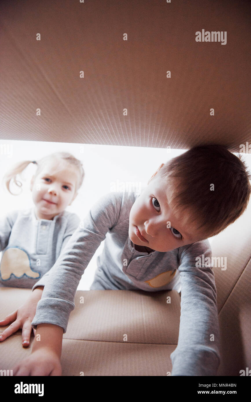 Beautiful girl inside cardboard box hi-res stock photography and images ...
