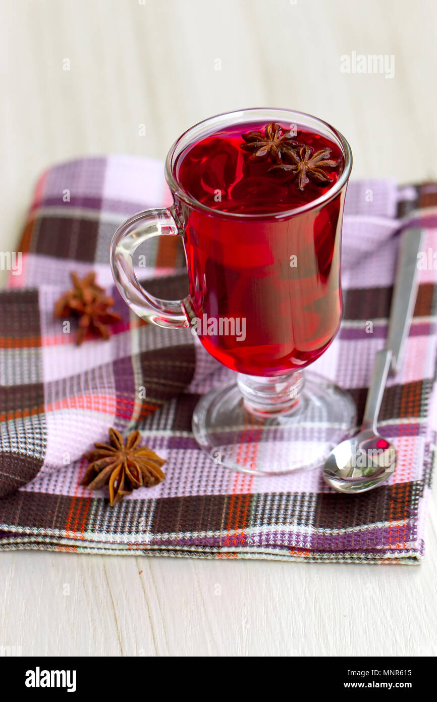 Red Tea (karkade) with anisetree in a transparent glass beaker Stock ...