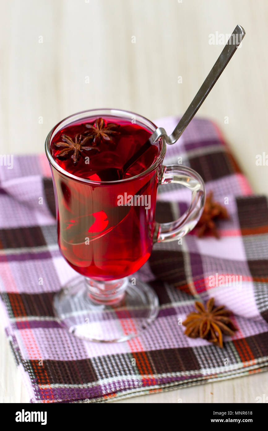 Red Tea (karkade) with anisetree in a transparent glass beaker Stock ...
