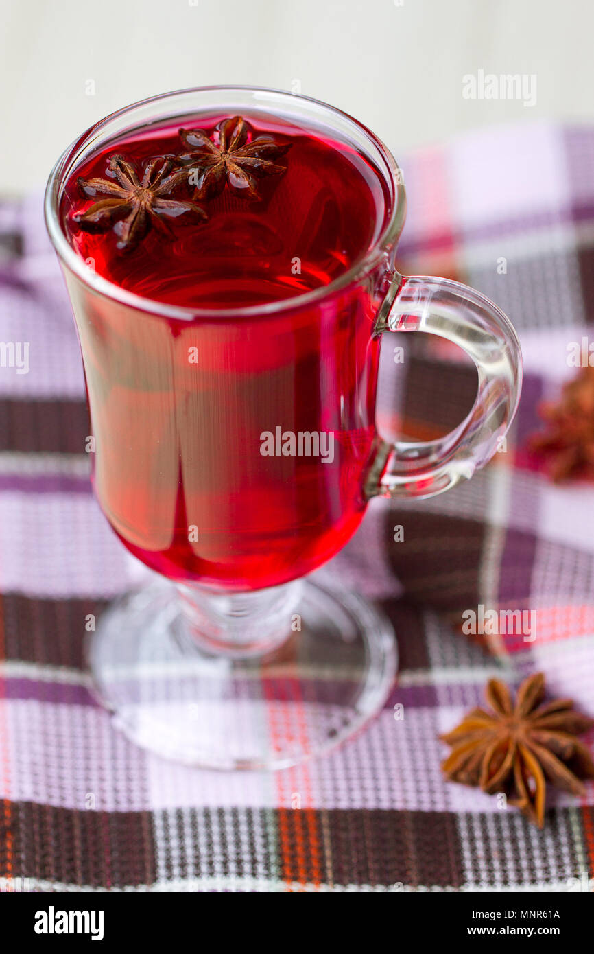 Red Tea (karkade) with anisetree in a transparent glass beaker Stock ...