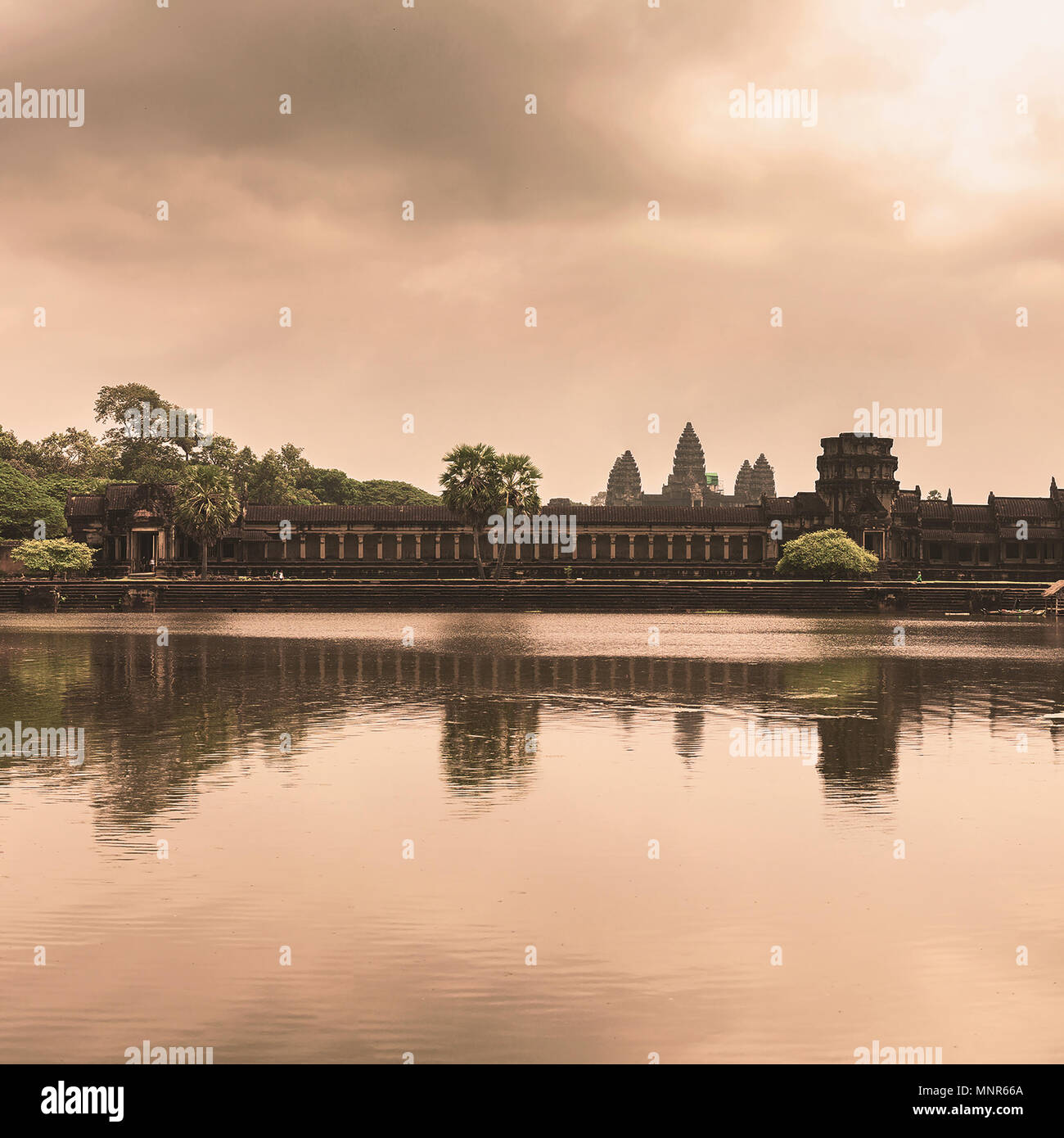 Angkor Wat temple with reflecting in water Stock Photo - Alamy