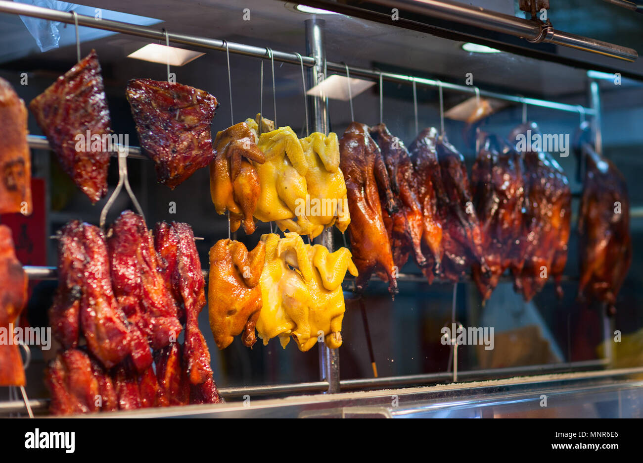 Grilled chicken on market at Hong Kong Stock Photo - Alamy