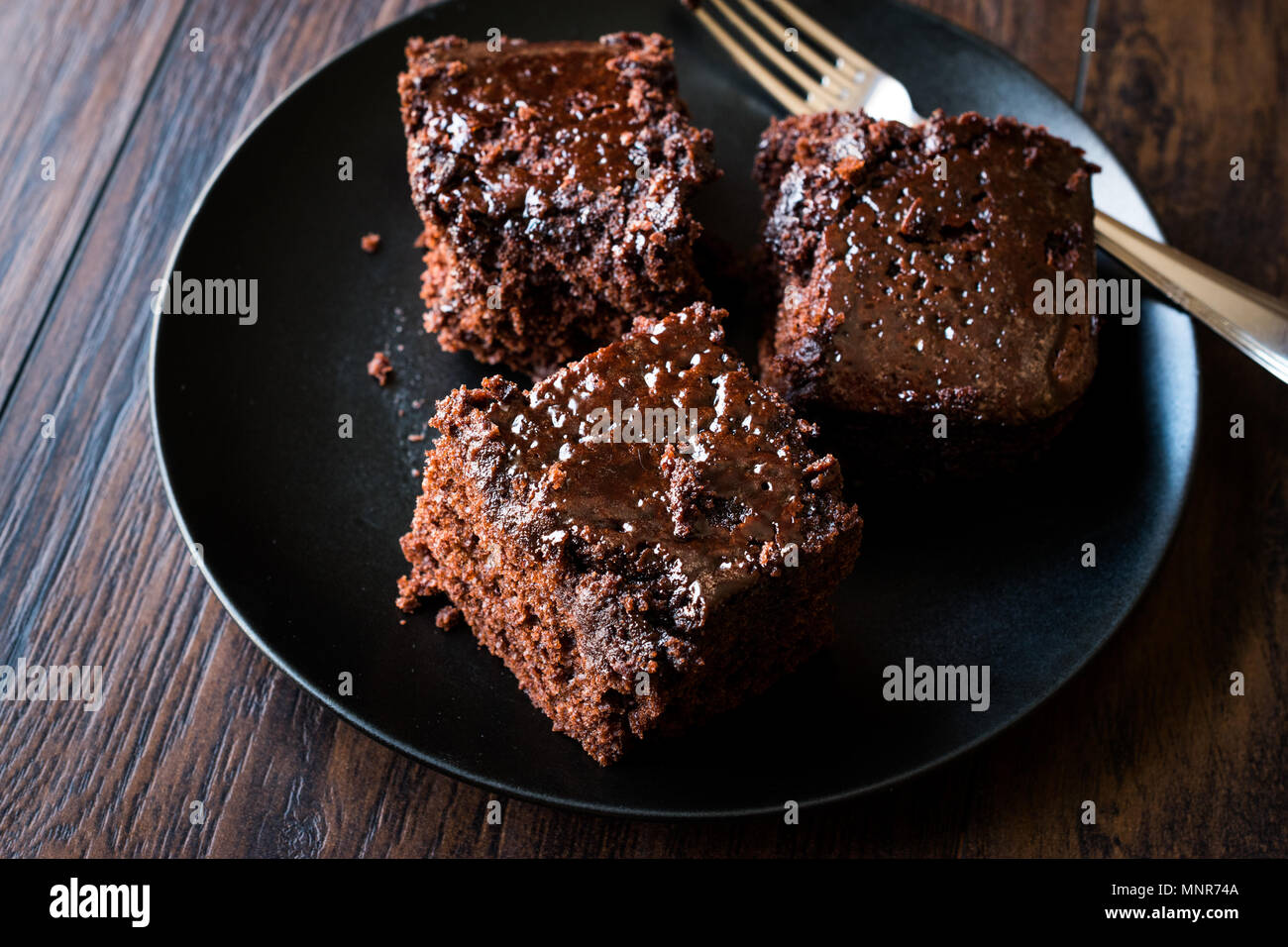 Moist Chocolate Sponge Cake Brownie Pieces in Black Plate. Organic ...