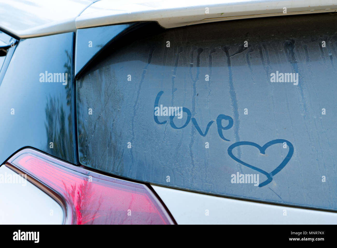love heart drawn on the car windshield, dust and dirty windshield Stock ...