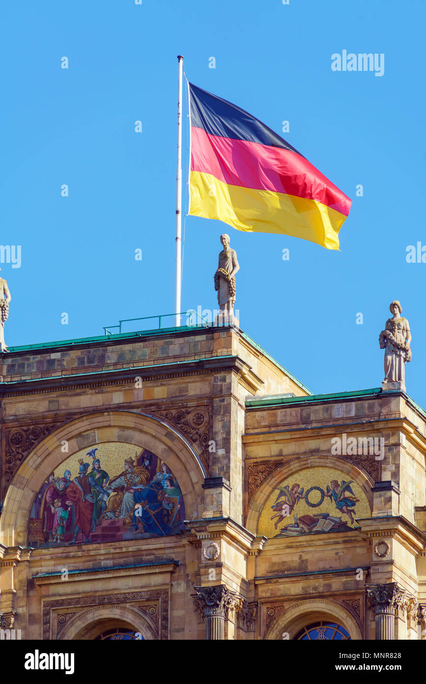 Waving German flag above The Maximilianeum palace (1874), seat of ...