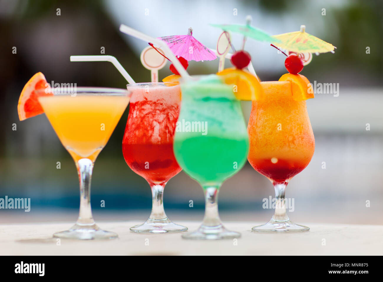 Exotic cocktails in a tropical setting Stock Photo - Alamy