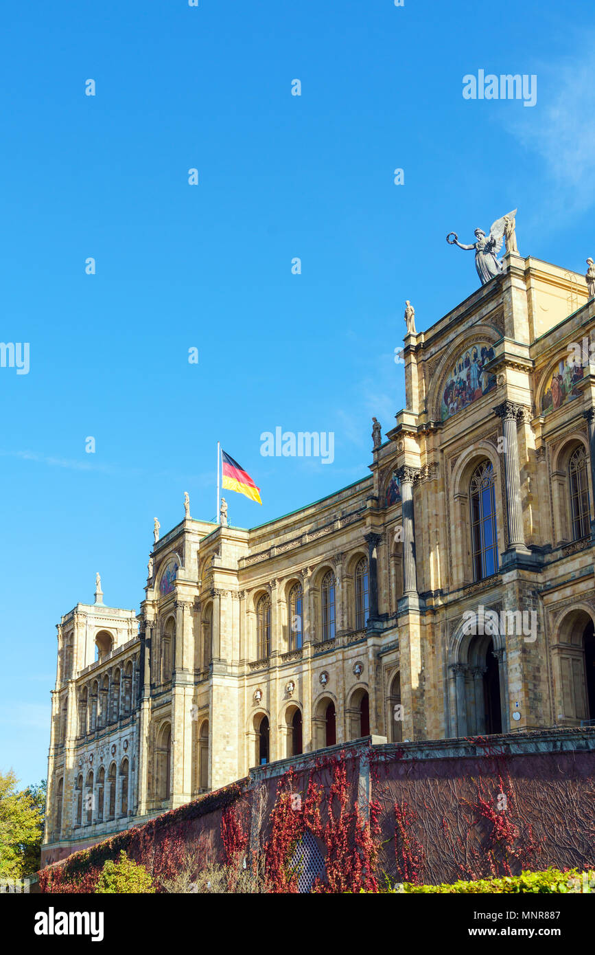 Waving German flag above The Maximilianeum palace (1874), seat of ...