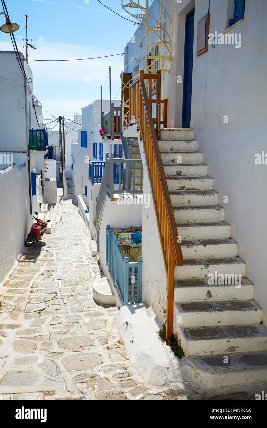 Typical street of greek traditional village with white walls and ...