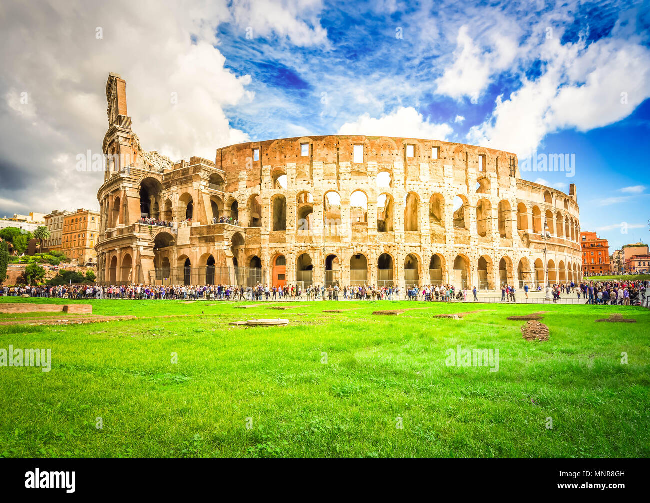 ruins of antique Colosseum building at spring day in Rome Italy , toned ...