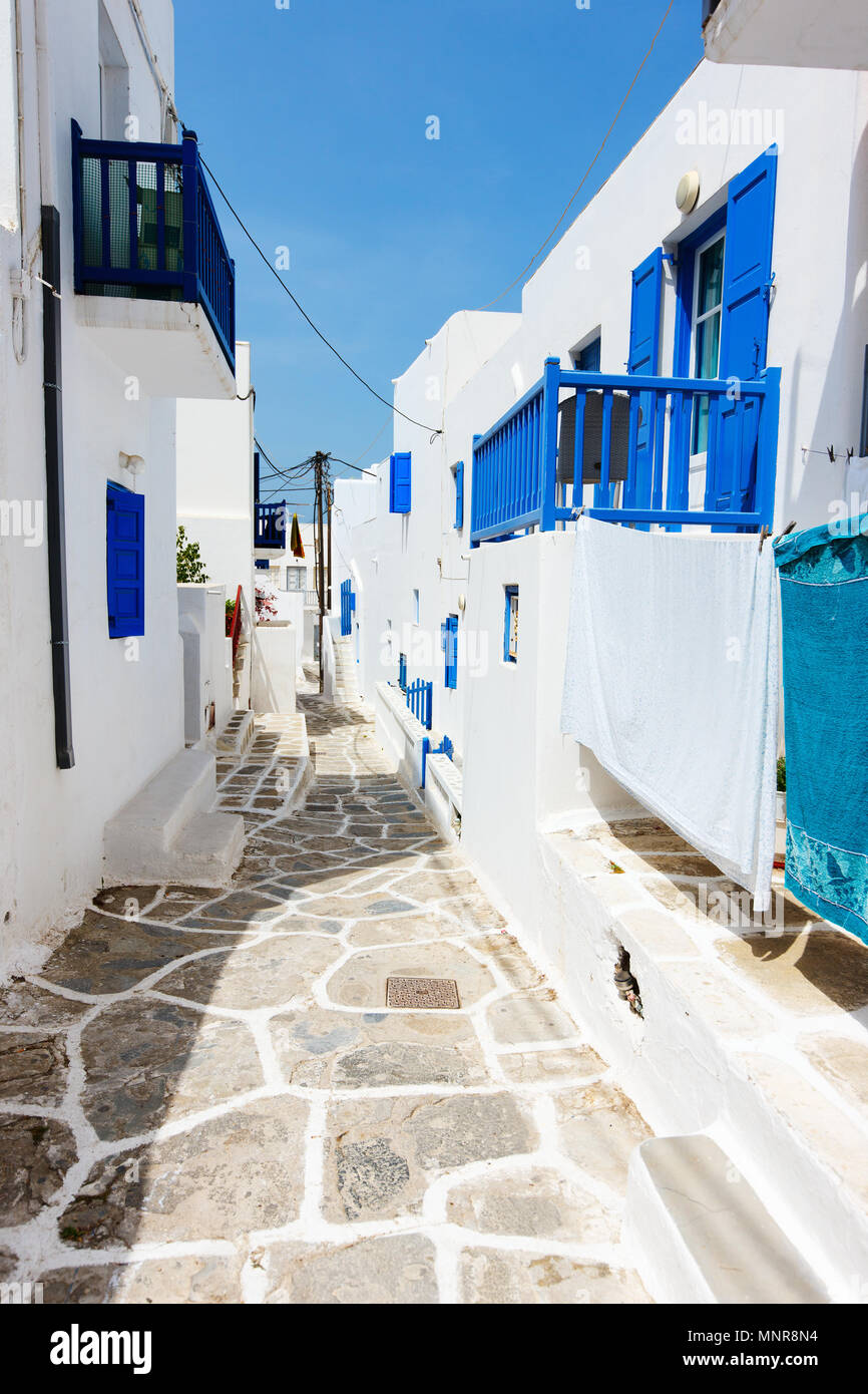 Typical greek traditional village with white walls and colorful doors ...