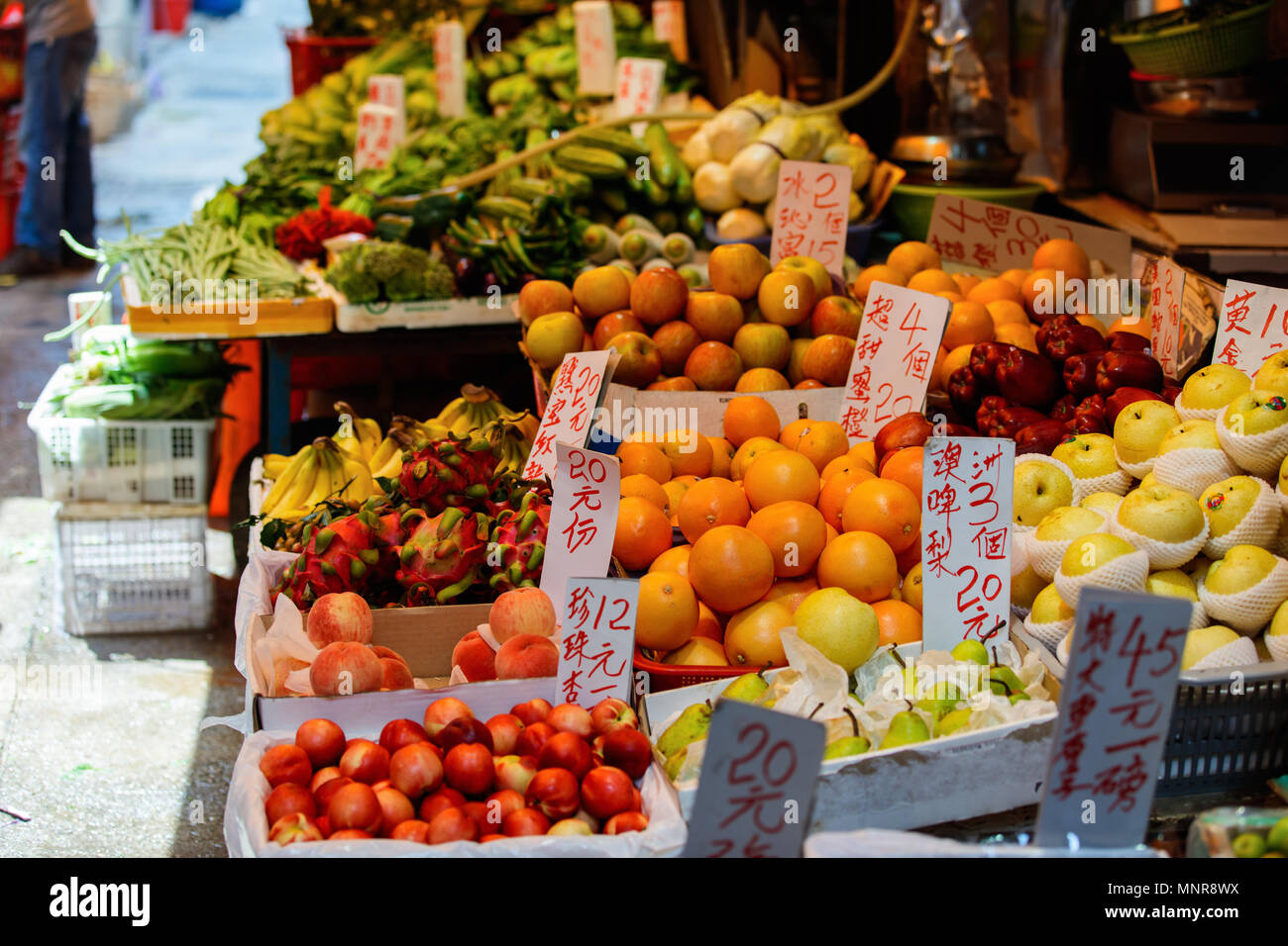 Assortment of fresh fruits on outdoor market stall Stock Photo - Alamy