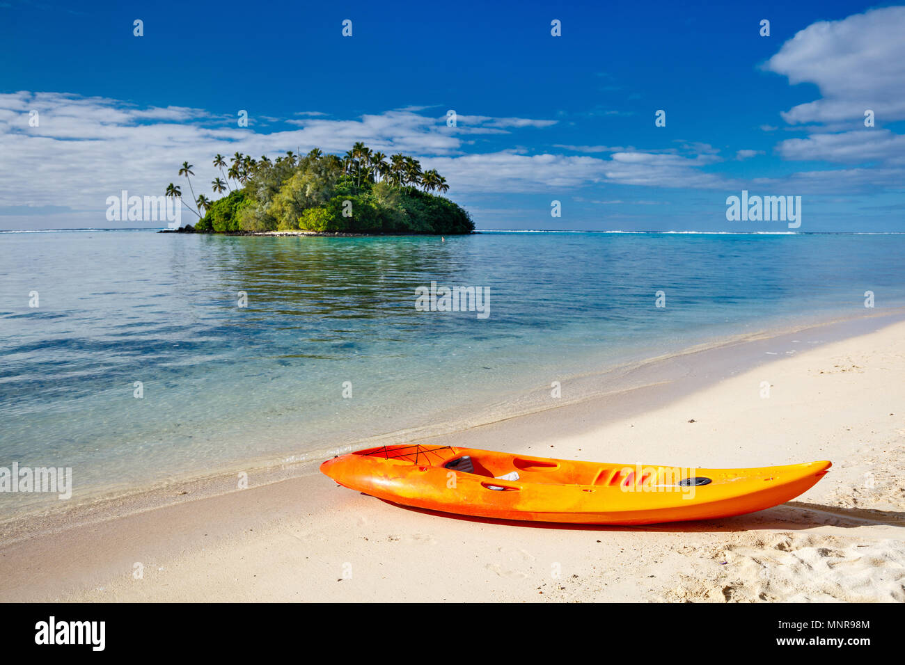 Colorful kayak at beautiful tropical beach with palm trees, white sand ...