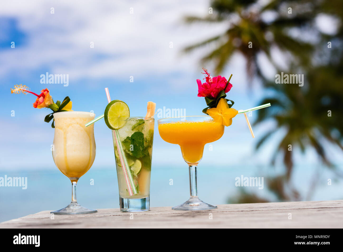 Exotic cocktails in a tropical setting Stock Photo - Alamy