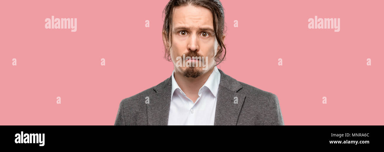 Handsome young man with sad and upset expression, unhappy Stock Photo ...