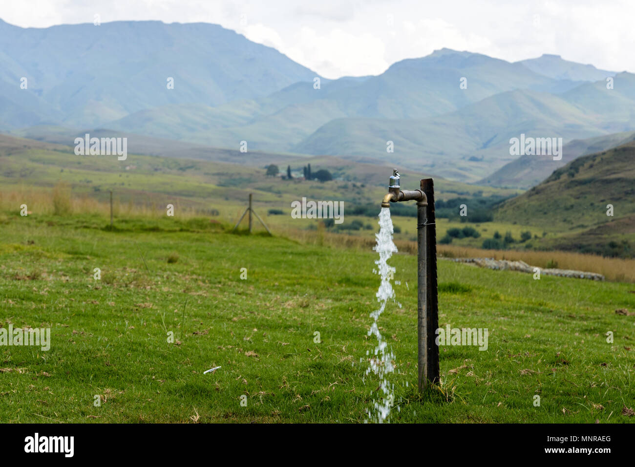 Running tap in rural setting Stock Photo - Alamy