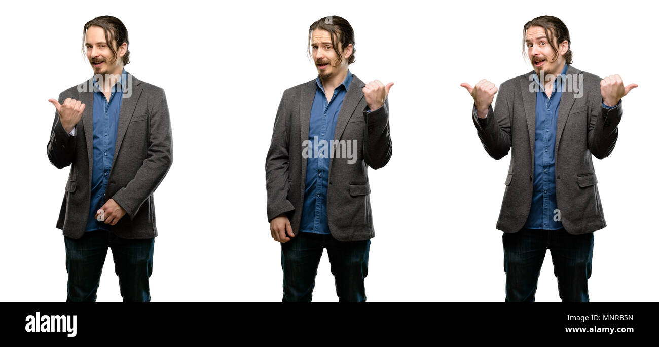 Handsome young man pointing away side with his finger Stock Photo - Alamy