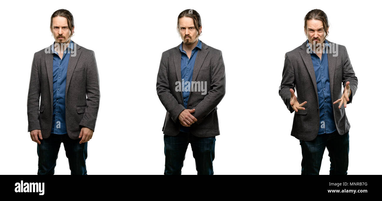 Handsome young man irritated and angry expressing negative emotion ...