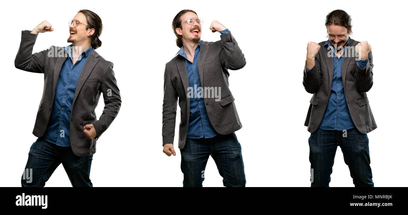 Handsome young man happy and excited celebrating victory expressing big ...